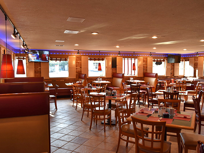 Blue accent lighting creates that perfect diner ambiance&mdash;part nostalgic comfort, part "we take breakfast seriously enough to have mood lighting."