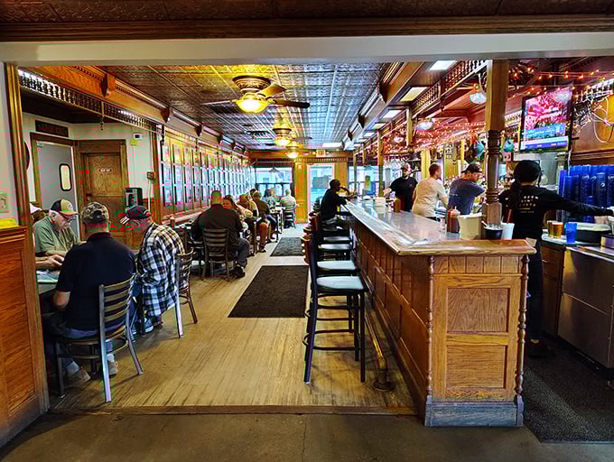 Step inside and time slows down &ndash; the warm wood paneling, classic bar, and ornate tin ceiling create the kind of authentic atmosphere money can't manufacture.