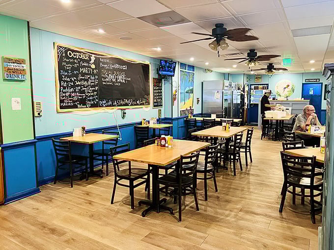 Inside, the mint-blue walls and wooden tables create that perfect "everybody knows your name" vibe. The chalkboard menu hints at treasures to come.