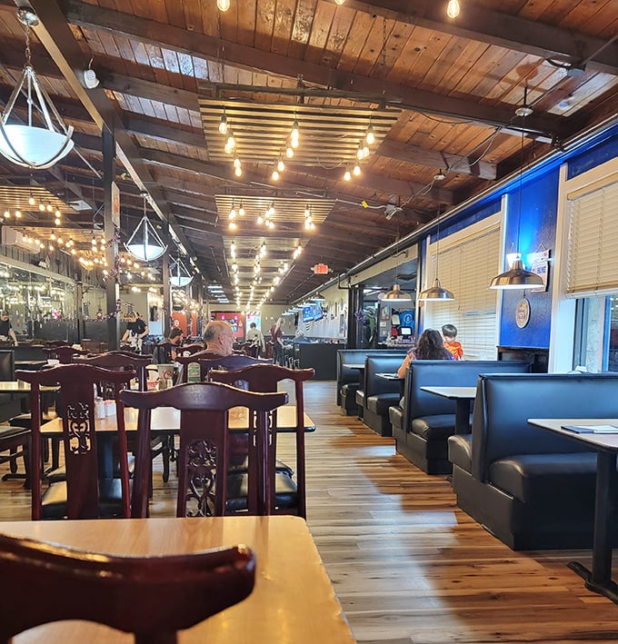 Wooden beams, warm lighting, and comfortable seating create the perfect backdrop for the serious business of seafood consumption.