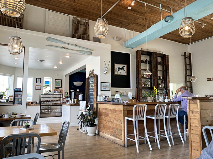 Warm wooden beams, basket pendant lights, and a rustic-meets-modern aesthetic create the perfect backdrop for memorable meals that feel like coming home.