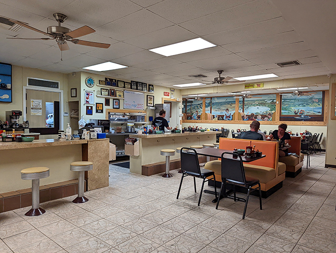 Classic diner aesthetics meet Florida Keys charm inside Doc's, where ceiling fans lazily spin above booths that have hosted countless vacation-starting breakfasts.