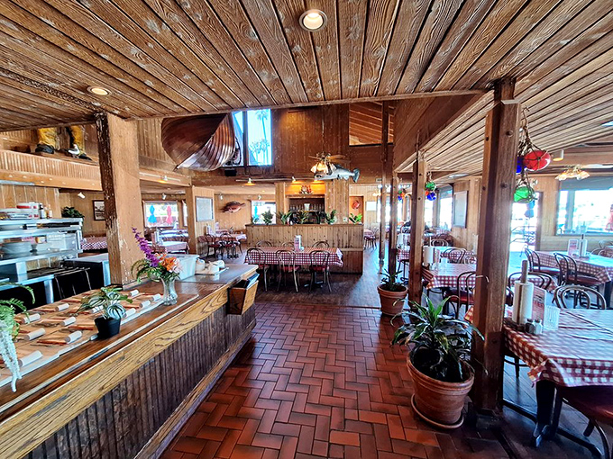 Wooden ceilings, classic red-checkered tablecloths, and brick floors create that perfect "I've discovered something special" seafood shack atmosphere.