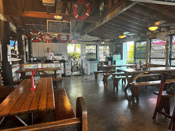 Wooden picnic tables and nautical decor create that perfect "I've discovered something authentic" feeling that makes vacation stories worth telling.