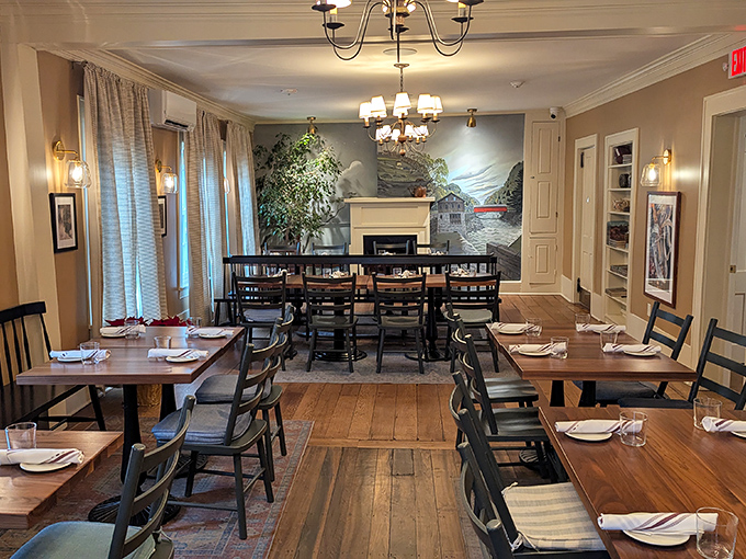 Exposed beams and warm lighting create an atmosphere where every meal feels like a celebration worth savoring.
