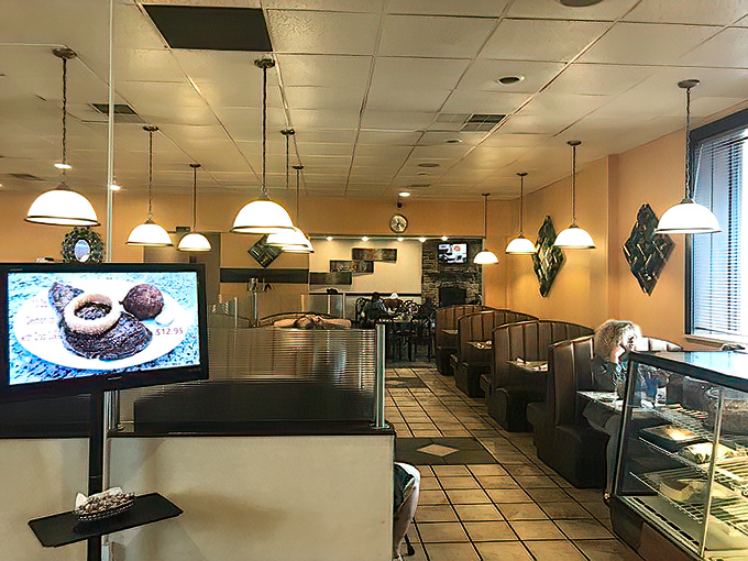 Classic diner ambiance with pendant lighting and cozy booths &ndash; where conversations flow as freely as the coffee refills.