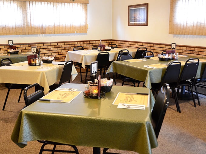 Classic supper club simplicity at its finest &ndash; olive green tablecloths, brick accents, and not a pretentious bone in the building. This is where memories are made over butter and beef. 