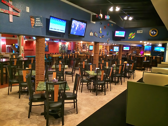 Rope-wrapped pillars and nautical decor transform this spacious dining room into a maritime getaway where conversations flow as freely as the drinks.
