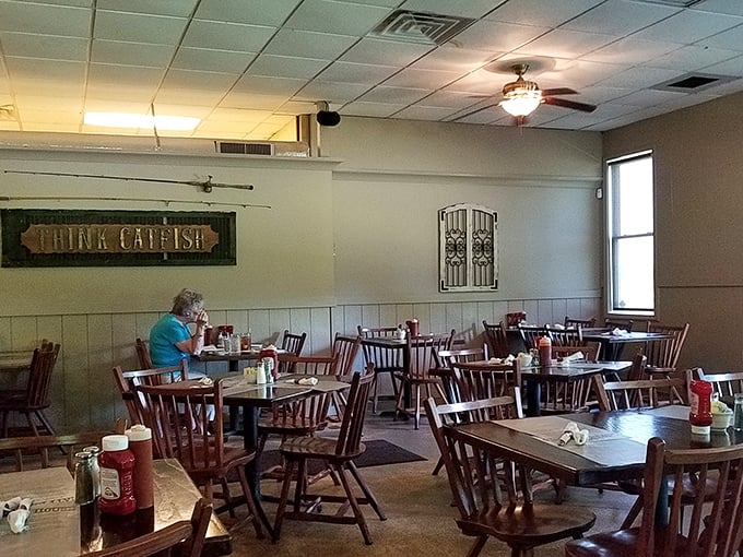 Simple wooden chairs and that iconic "Think Catfish" sign tell you everything you need to know &ndash; you're in for authentic, no-nonsense Southern cooking.