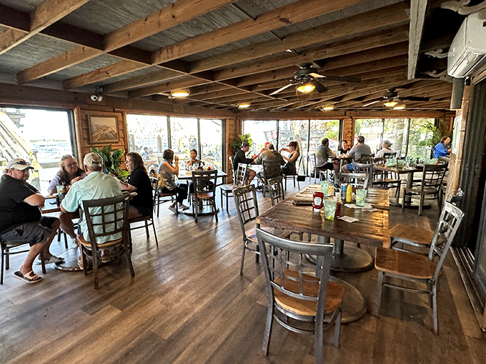 Rustic wooden beams frame waterfront views while diners savor island cuisine. This isn't just a meal&mdash;it's a vacation without the TSA pat-down.