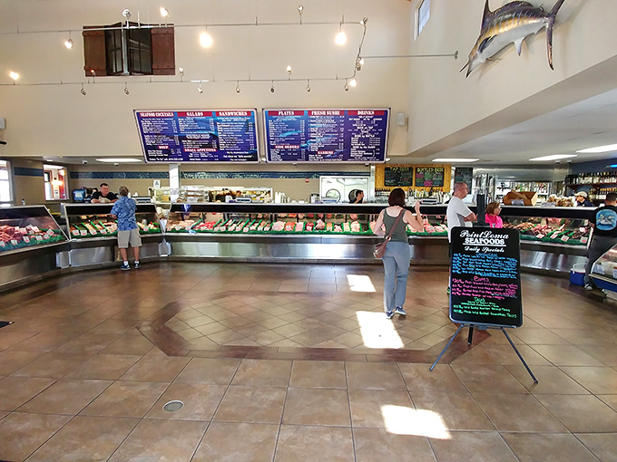 A seafood lover's paradise awaits inside, where display cases showcase the ocean's bounty and menus tempt with possibilities that were swimming just hours ago.