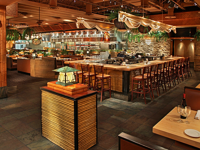 The heart of Bimini Twist reveals itself: warm woods, stone accents, and an open kitchen where culinary magic happens before your very eyes.