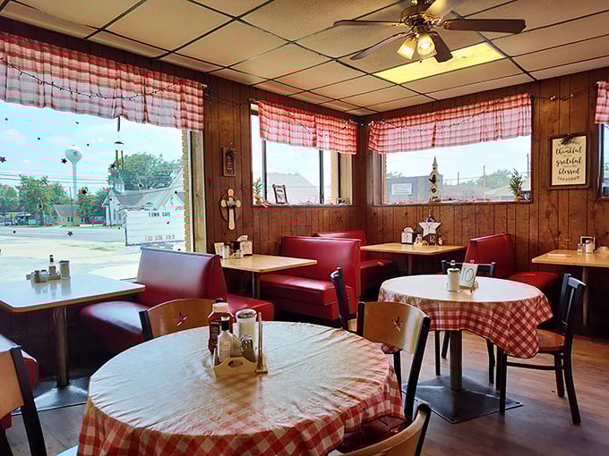 Red vinyl booths and checkered tablecloths create the perfect backdrop for morning conversations that range from weather forecasts to local gossip.
