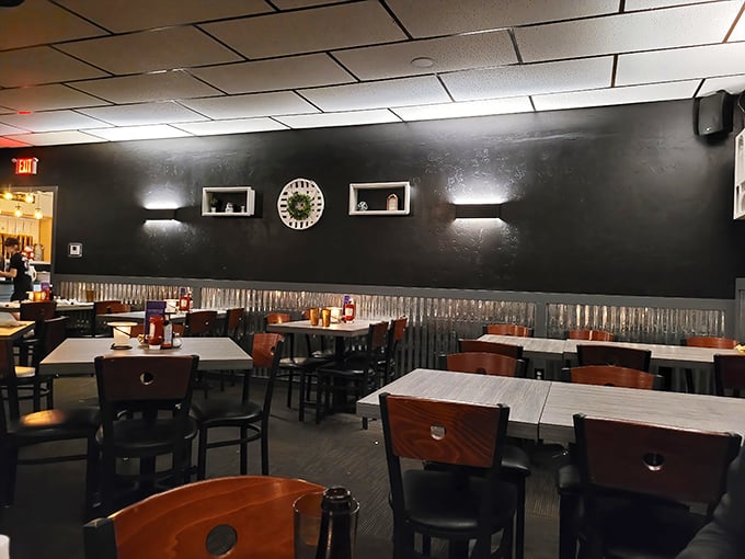 Classic Wisconsin supper club ambiance: dark walls, comfortable seating, and the promise of hearty meals that'll make your cardiologist wince but your soul sing.