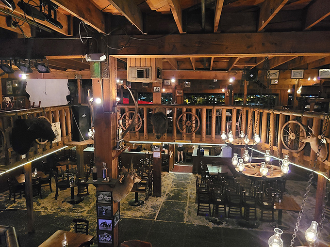 Step inside and you're transported to a Western wonderland where wagon wheels meet wooden beams. John Wayne would approve of this multi-level cowboy paradise.