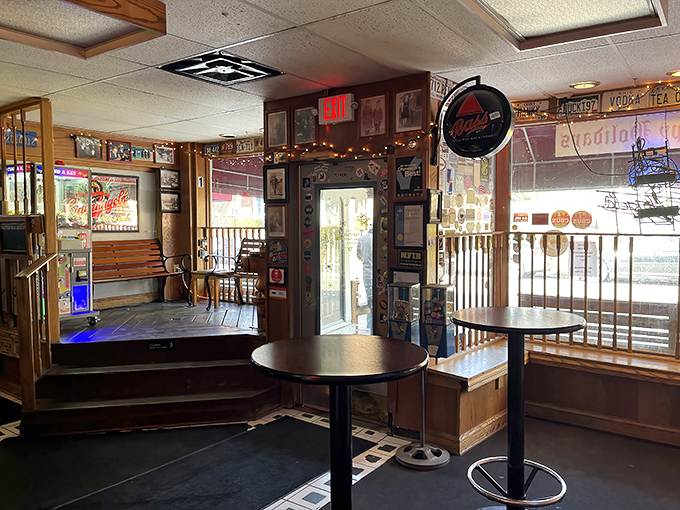 Step inside and you're greeted by decades of memorabilia, neon signs, and the unmistakable buzz of happy diners plotting their burger strategy.