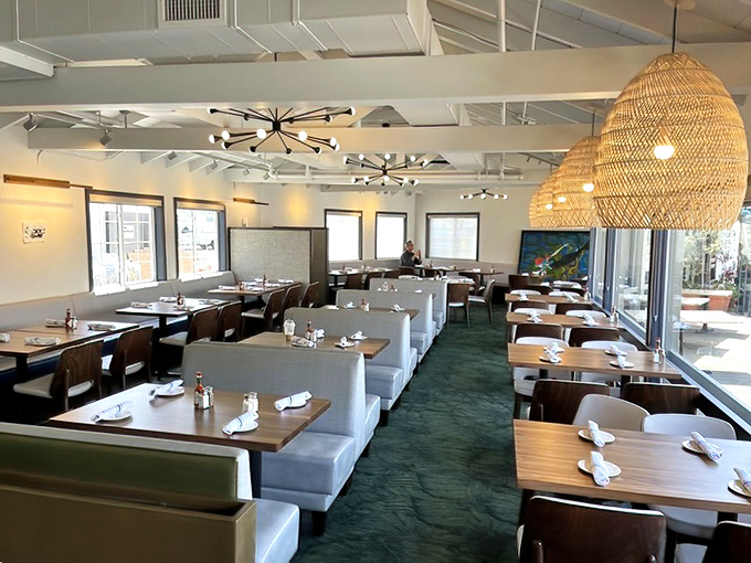 Inside, woven pendant lights cast a warm glow over the dining room, creating that perfect "I've arrived somewhere special" feeling.