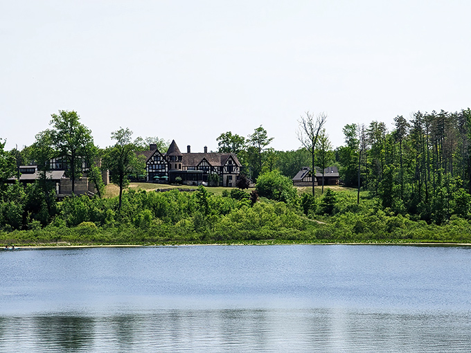 Mother Nature's infinity pool. The glacial lake offers a mirror to the sky, while the manor house stands sentinel over this tranquil Ohio masterpiece.