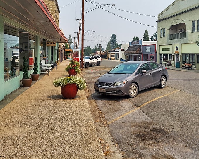 Flower pots and wide sidewalks create Etna's version of urban planning. The bakery's aroma travels farther than your cell signal here.