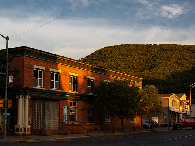 Main Street stretches before you like a living museum of Americana, framed by mountains that have watched over generations of Emporium residents.