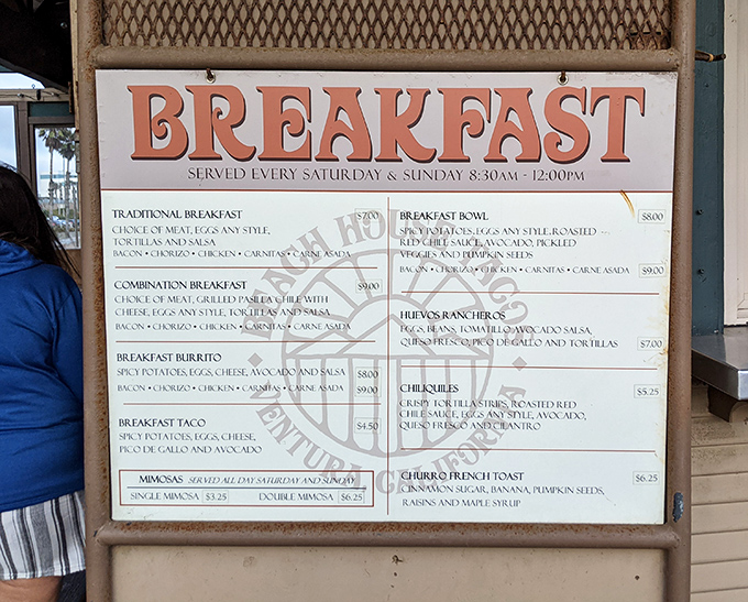Weekend breakfast at the beach? The menu board promises morning magic with churros French toast that would make your abuela proud.