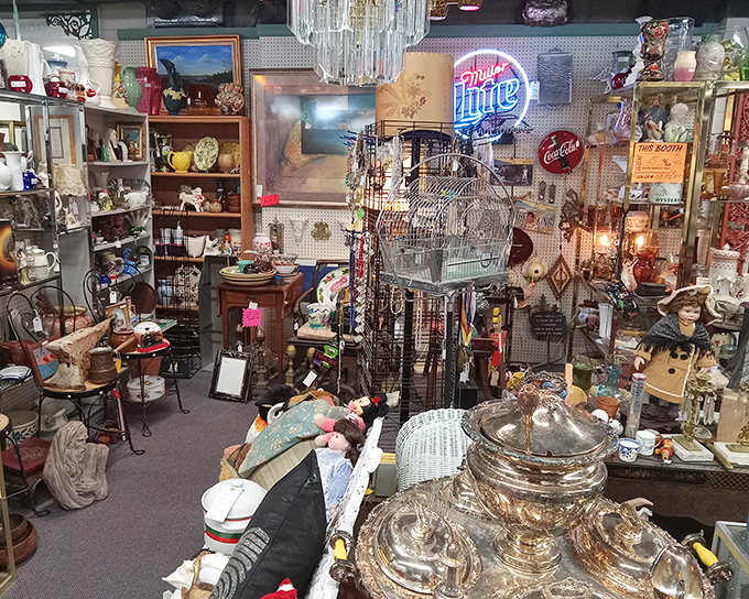 Vintage neon signs illuminate treasures below like a Las Vegas for nostalgics. That Miller Lite sign probably witnessed some stories worth telling!