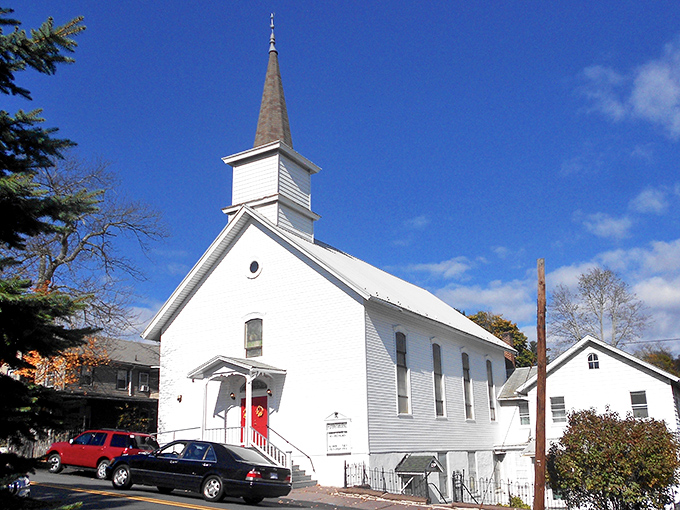 This classic white church stands as a testament to small-town America's enduring faith and architectural elegance.