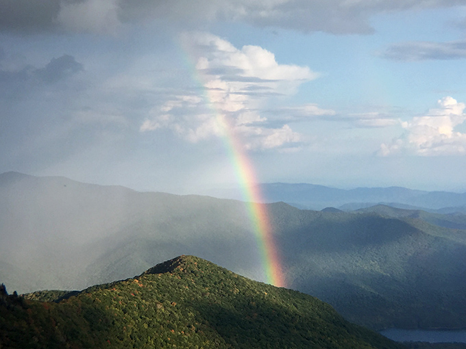 Mother Nature showing off with a rainbow that seems to say, "You think the view was good before? Hold my cloud."