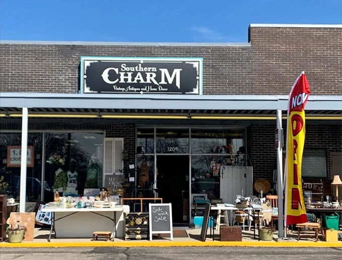 The sidewalk display works like a retail appetizer &ndash; just enough vintage garden tools and weathered furniture to make you hungry for the main course inside. 