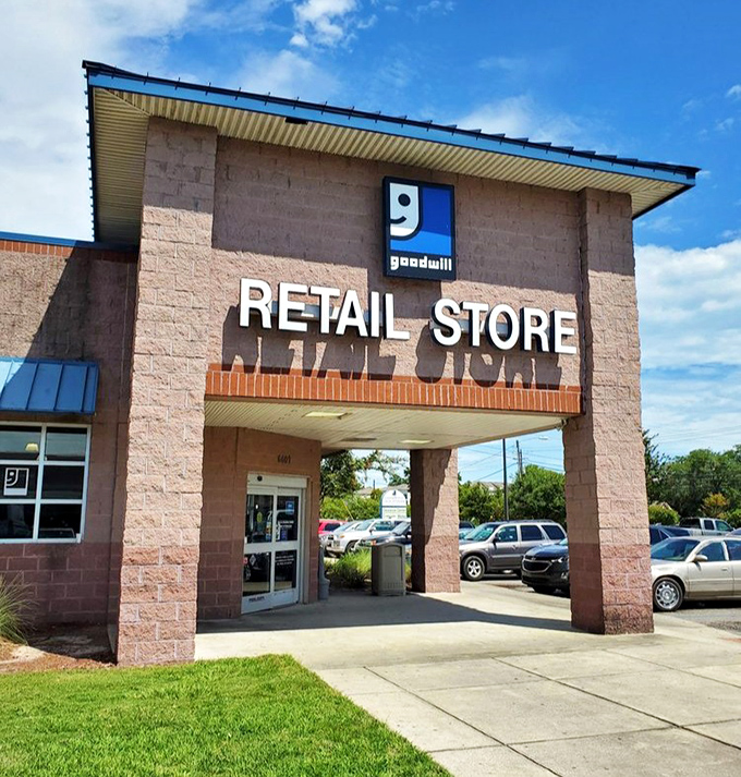 Blue skies frame the iconic "g" logo, welcoming bargain hunters and treasure seekers alike. The entrance promises adventure for those willing to explore.