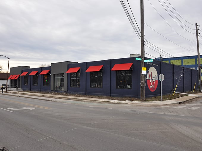 Those red awnings aren't just for show—they're like welcome signs beckoning bargain hunters into a world where shopping and social good collide.