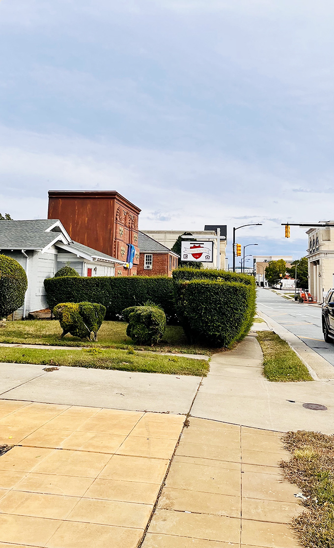 From street level, this colossal dresser towers over the neighborhood like a furniture-loving Gulliver in a land of Lilliputian homes.