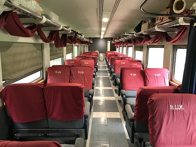 Rows of plush burgundy seats invite passengers to settle in and watch the world roll by. No middle seats, no overhead bins&mdash;just pure, civilized travel.
