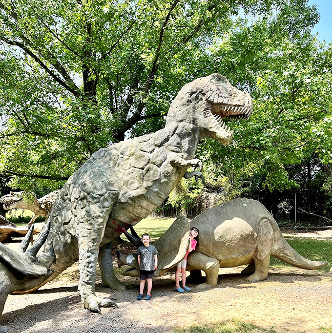 Size matters at Dinosaur Land! These massive fiberglass beasts provide perfect photo opportunities that make everyone feel delightfully small by comparison.