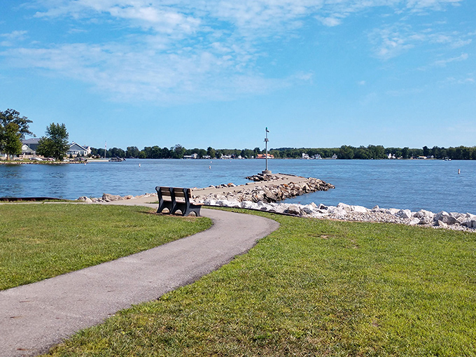 A bench with a view worth sitting for. This lakeside path offers the perfect spot to contemplate life's big questions&mdash;or just watch boats go by.