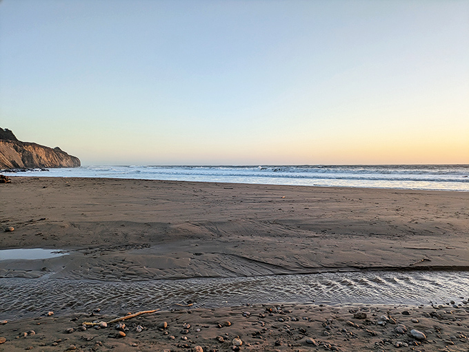 Dawn breaks over Mendocino's coastline, painting the sky in pastels. The calm before visitors arrive to discover California's geological oddity.