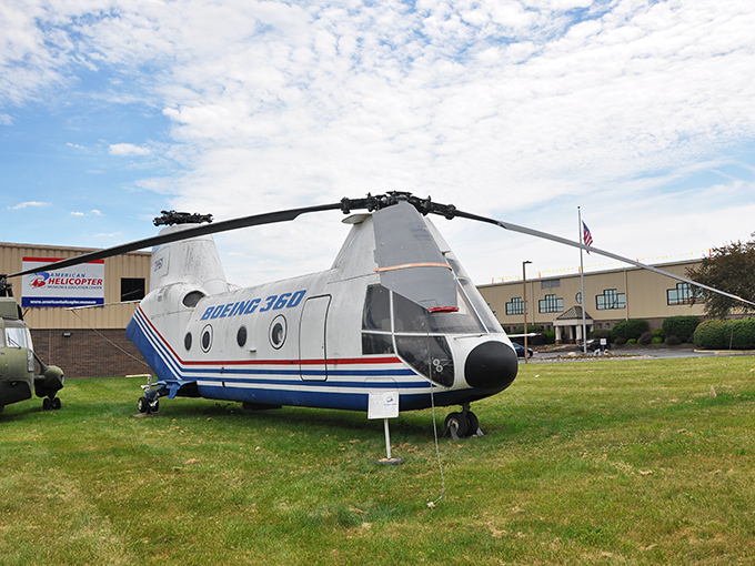 The sleek Boeing 360 looks ready for takeoff, its distinctive tandem rotor design showcasing helicopter innovation that would make Leonardo da Vinci proud.