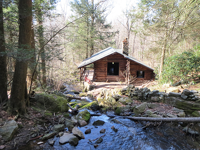 This rustic cabin nestled alongside a babbling brook feels like stepping into a Thoreau daydream&mdash;minus the required self-reliance and mosquito swatting.