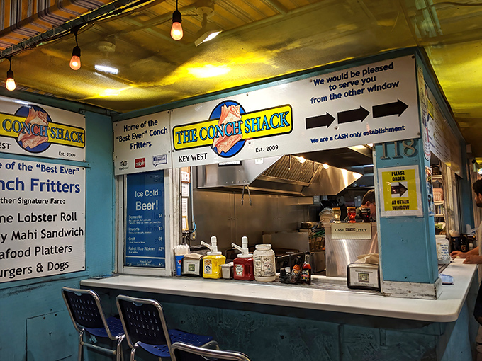 The magic happens behind this humble counter where conch dreams come true and diet plans go to die &ndash; gloriously and without regret.