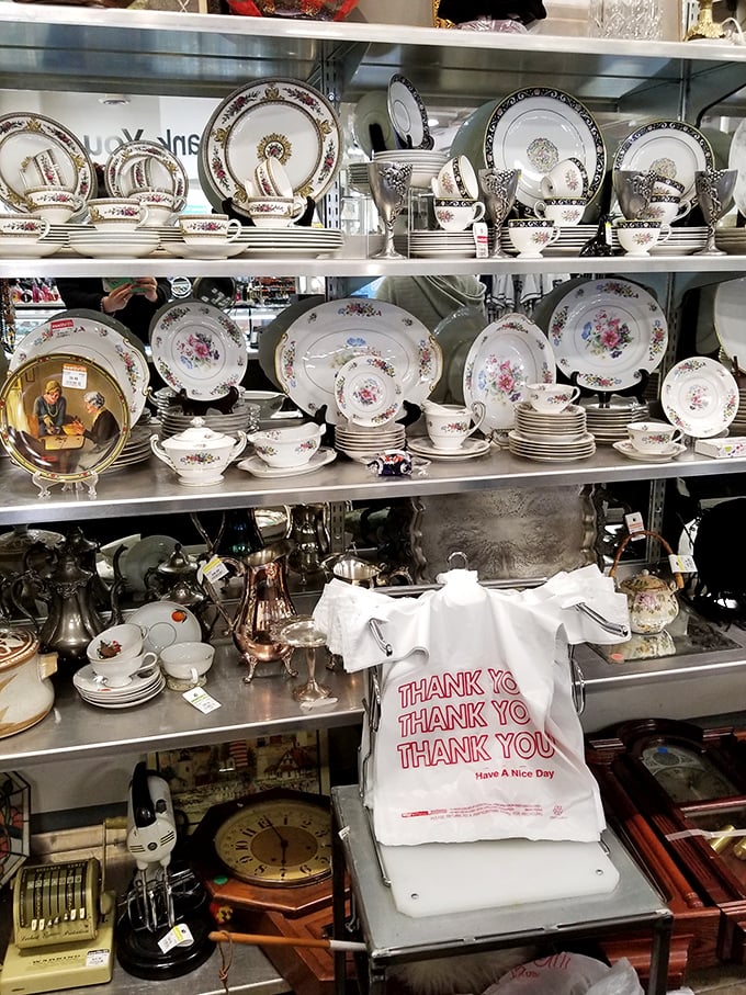 Grandma's china cabinet has nothing on this display. Elegant place settings wait patiently for their second act in someone's dining room drama.
