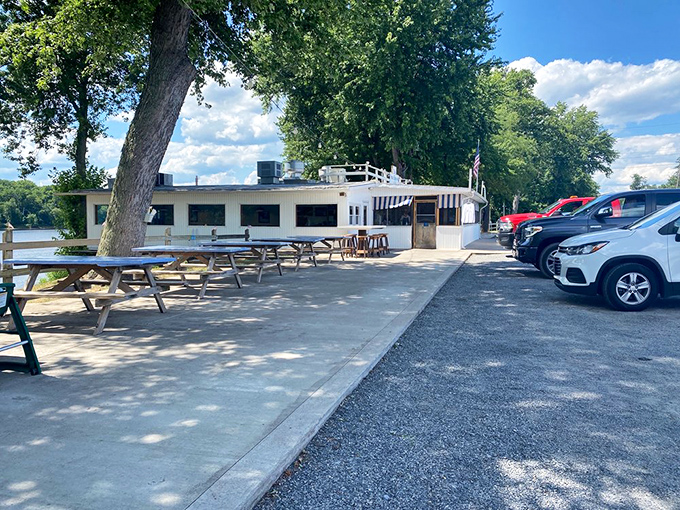 Picnic tables with a million-dollar view &ndash; The Fence's riverside setting turns a simple meal into an occasion worth remembering.
