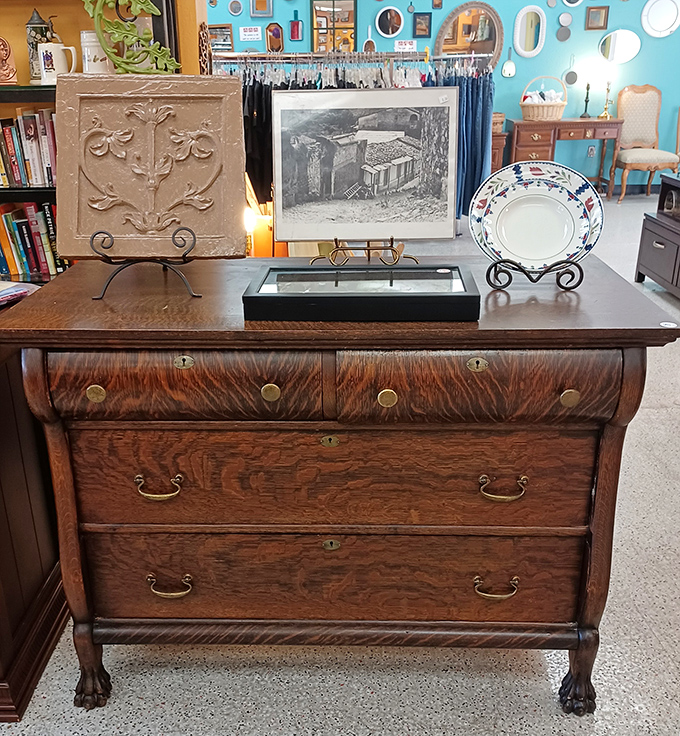 This isn't just a dresser; it's a time machine with drawers. Solid oak craftsmanship with claw feet that would make antique dealers weep.