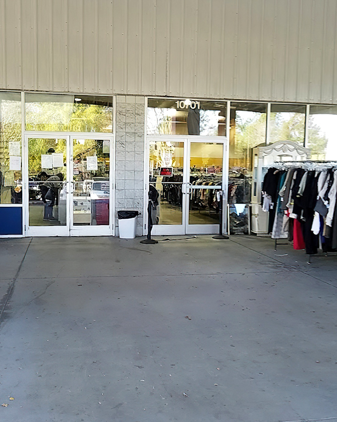 The entrance beckons with racks of clothing already spilling outside, a preview of the organized chaos awaiting within.