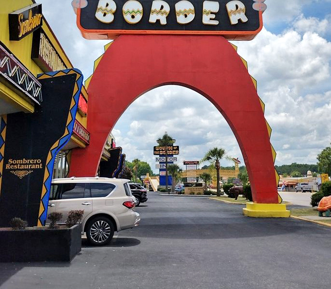 Pass through this vibrant arch and you've officially entered an alternate universe where subtlety went on permanent vacation decades ago. 