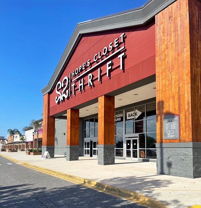 Sunshine bathes the entrance of this thrifting paradise, where wooden accents and modern design defy typical thrift store aesthetics.