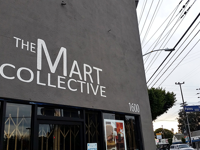The unassuming exterior of The Mart Collective stands like a vault of vintage treasures, its minimalist signage belying the maximalist wonderland within.
