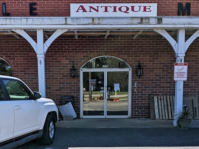 "Antique" isn't just a sign&mdash;it's a promise of adventures through time, all behind those unassuming glass doors.