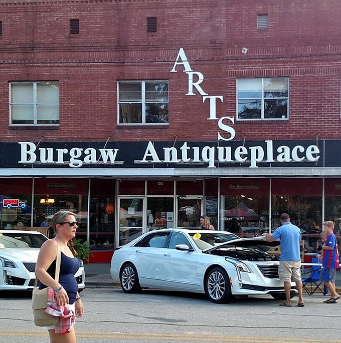 Where modern life pauses for a moment &ndash; the storefront draws in curious shoppers while the vertical "ARTS" sign serves as a downtown landmark. 