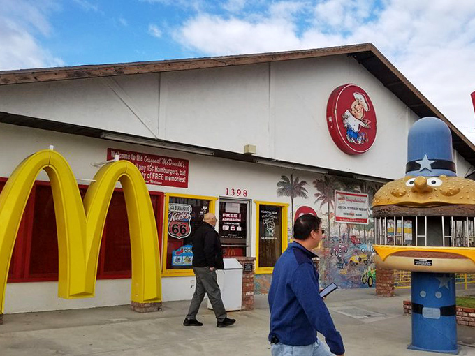 The classic red and white tiles whisper stories of simpler times and fifteen-cent hamburgers. 