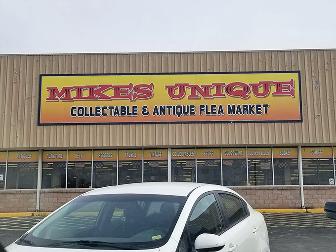 That vibrant yellow sign promises adventure for the curious soul. It's the antique hunter's equivalent of "X marks the spot."